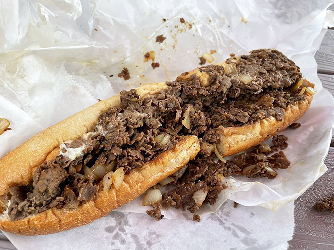 Meat poetry on a roll. This isn't just a sandwich&mdash;it's a perfectly choreographed dance of thinly sliced beef, melted cheese, and bread that deserves a standing ovation.