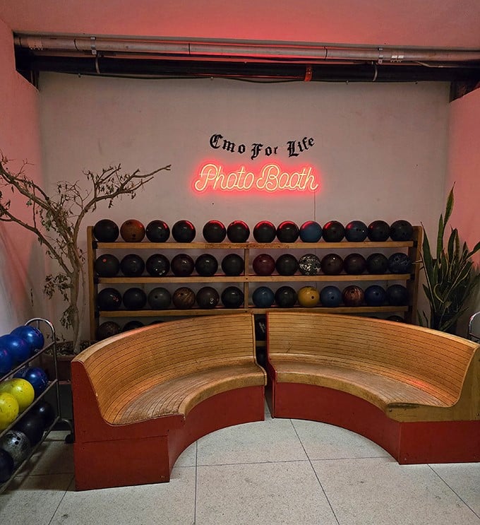 "Emo For Life" isn't just a phase at Mahall's photo booth, where vintage bowling balls create the perfect backdrop for capturing memories between frames.