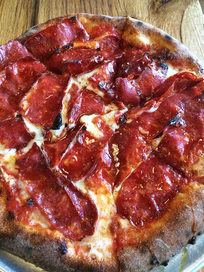 This isn't just pizza&mdash;it's a manifesto of proper Neapolitan technique. That leopard-spotted crust has the kind of char that makes pizza purists weep with joy.