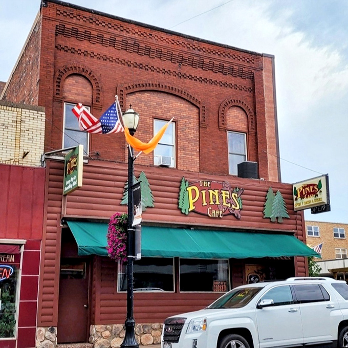 The Pines Cafe serves up comfort food beneath vintage brick, where the coffee's always hot and conversations flow easier than anywhere with fancy latte art.