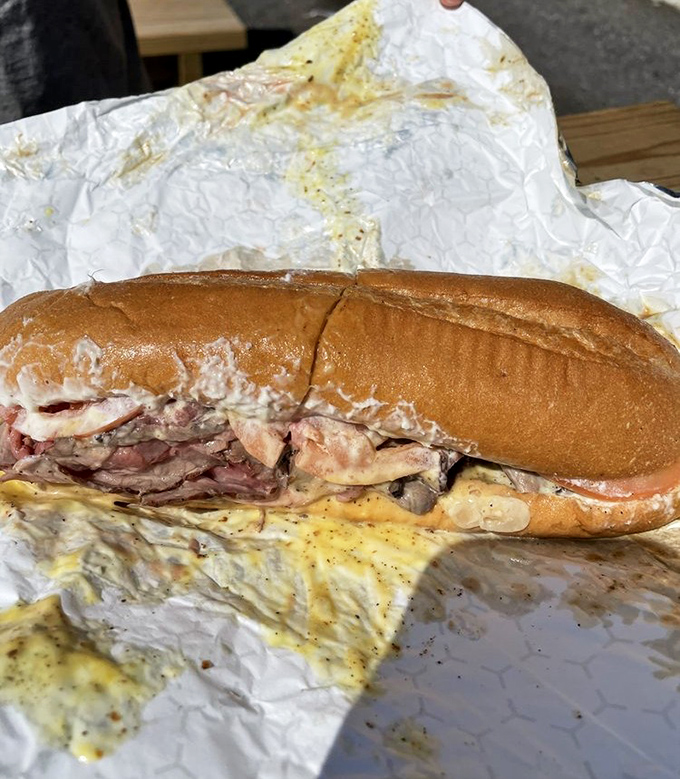 Behold the pit beef sub that's converting skeptics into believers, one smoky bite at a time.