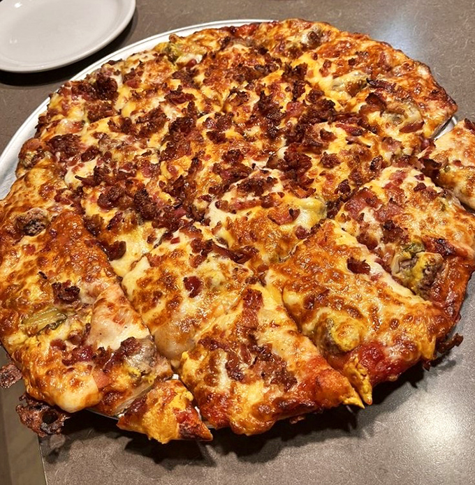 This isn't just pizza &ndash; it's edible art. The perfect ratio of cheese to toppings creates a harmonious symphony that makes taste buds stand and applaud.