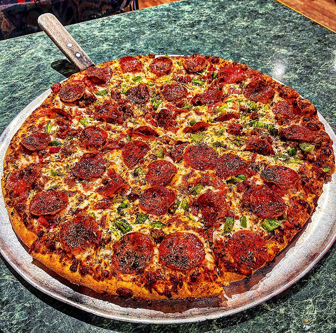 Pizza perfection doesn't need to wear a tuxedo. This pepperoni masterpiece with its blistered crust and melty cheese speaks the universal language of "get in my belly."