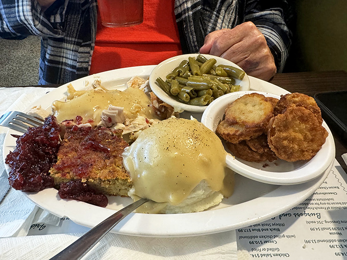 Southern breakfast perfection on a plate. When your eggs, country ham, and biscuits look this good, you know you're not in some chain restaurant's territory.