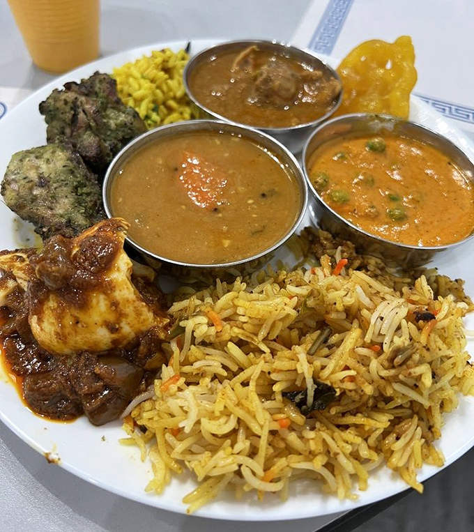 A plate that tells the story of India in one glance &ndash; fragrant biryani, vibrant curries, and that perfectly charred chicken calling your name.