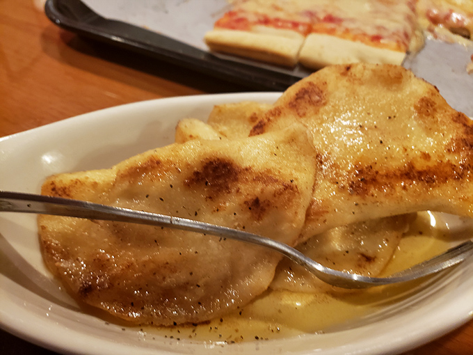 Golden-brown pierogies that would make your grandmother weep with joy&mdash;crispy exterior giving way to potato perfection that's worth every single calorie.