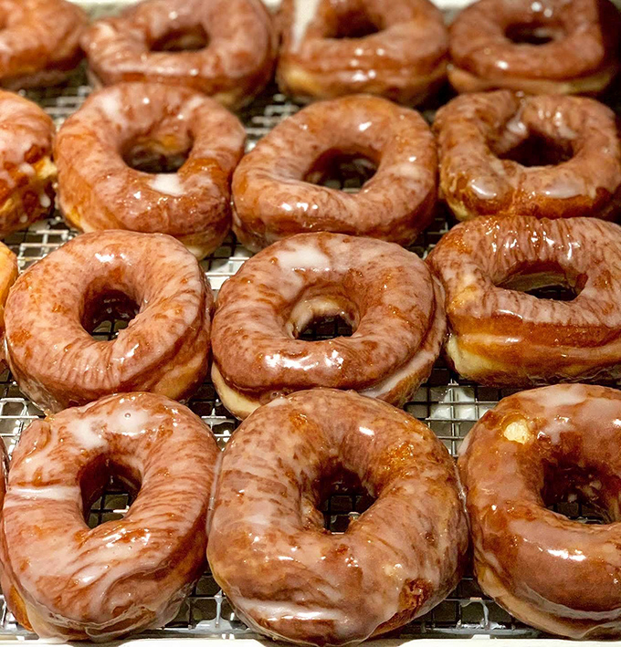 Glazed potato donuts glisten with sweet promise. These aren't your average hole foods&mdash;they're the reason alarm clocks were invented.
