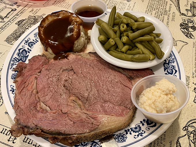 Prime rib so tender it practically surrenders at the sight of your fork, served with green beans that actually taste like vegetables.