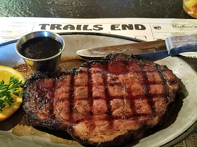 This isn't just prime rib; it's a masterclass in meat. The grill marks are practically autographs from a chef who knows exactly what they're doing.