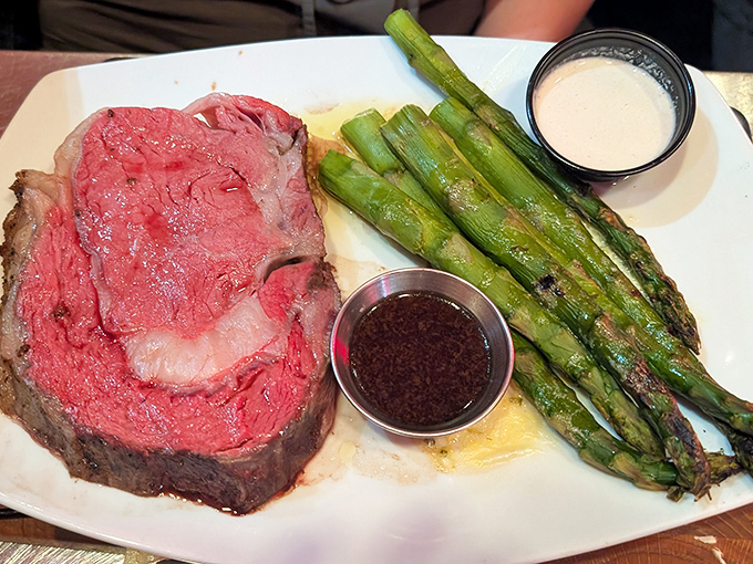 Behold the star of the show &ndash; prime rib so perfectly pink it should have its own Instagram account. Those asparagus spears aren't just sidekicks.