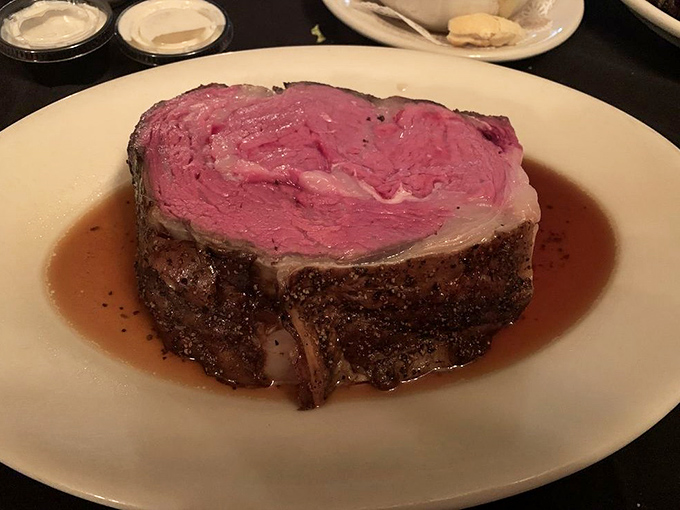 Behold the star of the show: prime rib so perfectly pink it should have its own Instagram account. That seasoned crust is what dreams are made of.