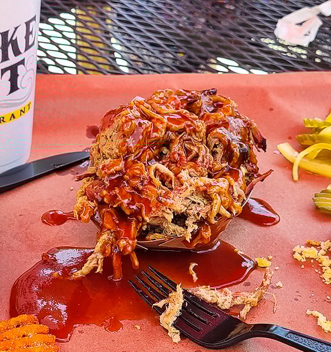Pulled pork so tender it surrenders without a fight, drowning gloriously in its own saucy perfection.