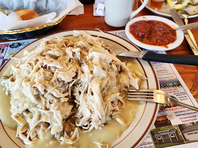 This mountain of pulled turkey smothered in gravy isn't just a meal—it's a commitment to an afternoon nap.