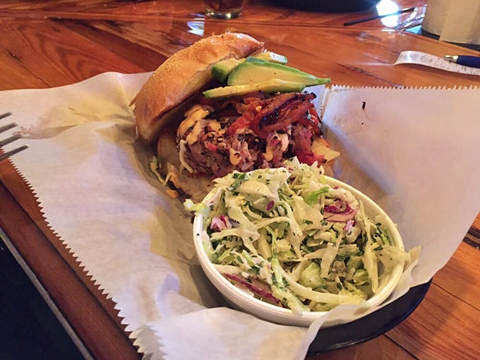 The pulled pork sandwich doesn't just sit on the plate&mdash;it commands it, with avocado adding a California twist to this Southern classic.