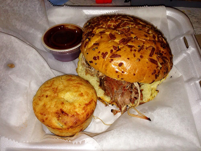 A pulled pork sandwich that doesn't just speak to you&mdash;it serenades. That golden cornbread muffin is the perfect backup singer.