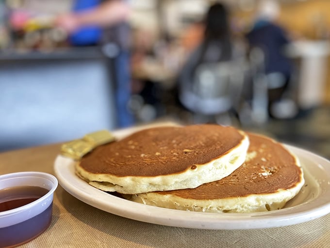 Golden pancakes that achieve the impossible balance of fluffy interior and crispy edges &ndash; the breakfast equivalent of finding the perfect pair of jeans.