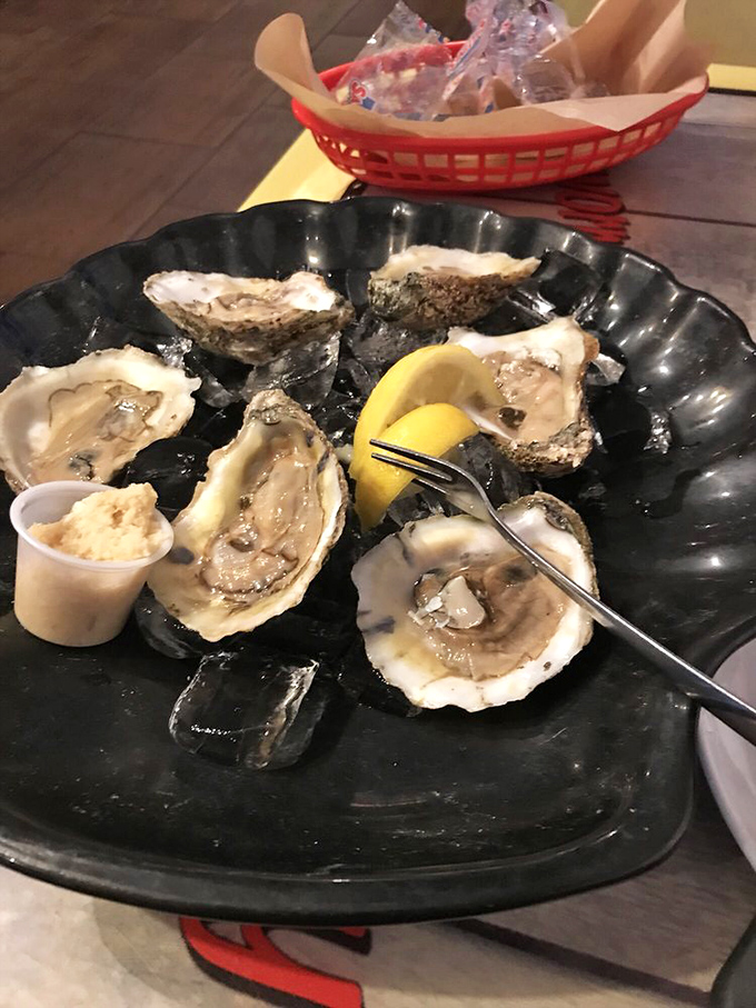 These glistening raw oysters aren't just seafood; they're little cups of ocean perfection waiting to transport you straight to briny paradise.
