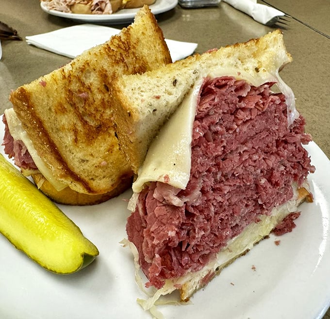 Behold the architectural marvel that is Slyman's corned beef sandwich. Engineers study it, poets write about it, the rest of us just unhinge our jaws and dive in.