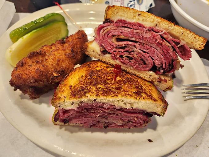 Behold the Reuben in all its glory&mdash;layers of corned beef, sauerkraut, and melted Swiss creating what can only be described as a sandwich symphony.