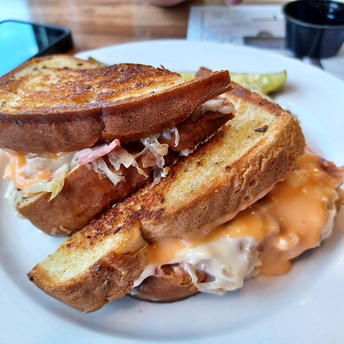 Behold the legendary Reuben in all its glory&mdash;grilled rye, melty Swiss, and that perfect ratio of corned beef to sauerkraut that makes time stand still.