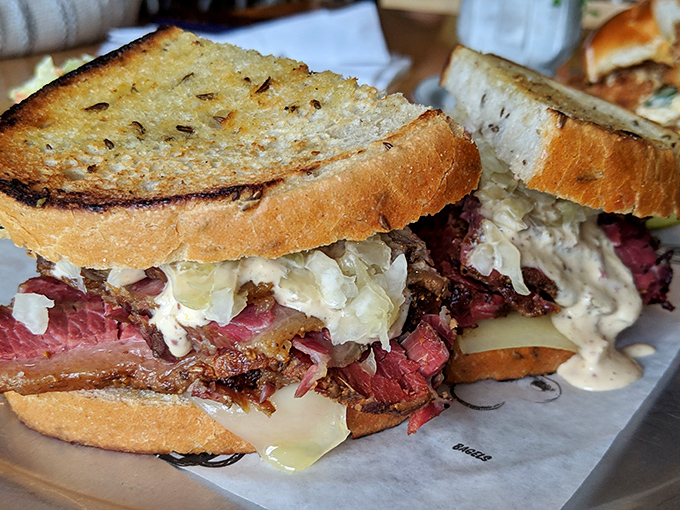 Behold the Reuben in all its glory &ndash; where house-cured brisket replaces traditional corned beef. This isn't just lunch; it's a religious experience between two slices of rye.