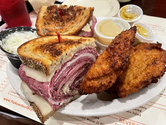 The Reuben arrives like a skyscraper of flavor&mdash;corned beef stacked so high you'll need a game plan just to take the first bite.