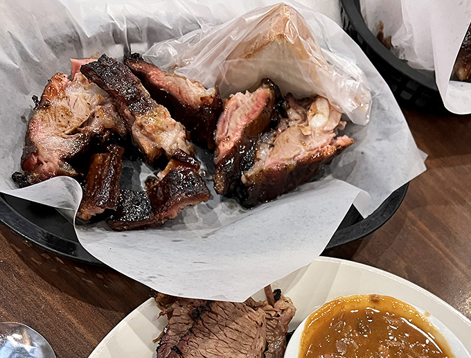 These rib tips aren't just cooked, they're conducted &ndash; a perfect harmony of smoke, spice, and that beautiful bark that makes barbecue lovers weak in the knees.