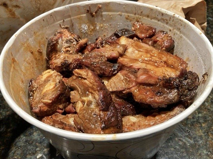 These glistening rib tips aren't just meat; they're edible Chicago history, each morsel telling a story of smoke, time, and tradition.