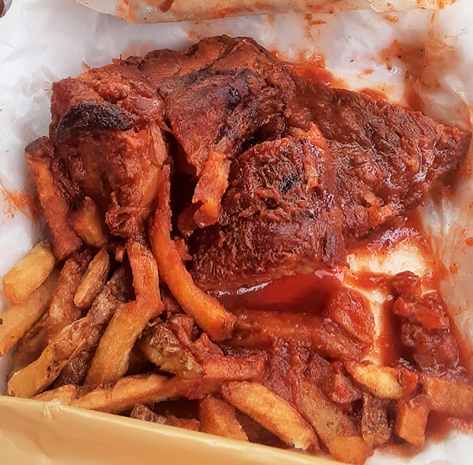 These rib tips aren't just falling off the bone&mdash;they're practically jumping onto your fork. The sauce-soaked fries underneath are the unsung heroes of this plate.