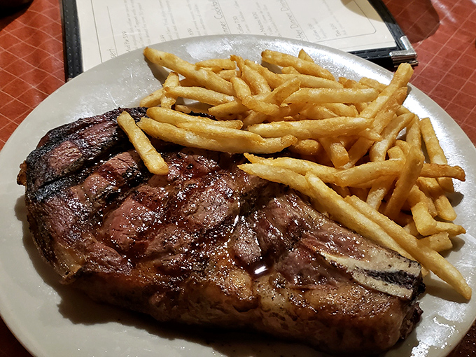 This isn't just a steak&mdash;it's a masterclass in mesquite grilling, with perfect grill marks telling a story of flame-kissed excellence.