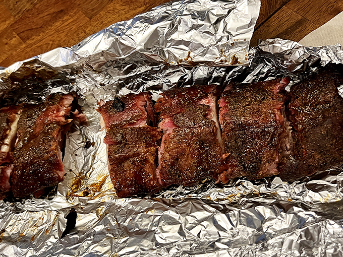 These ribs don't just have a smoke ring&mdash;they have a smoke halo. The kind of bark that makes you want to compose sonnets about pork.