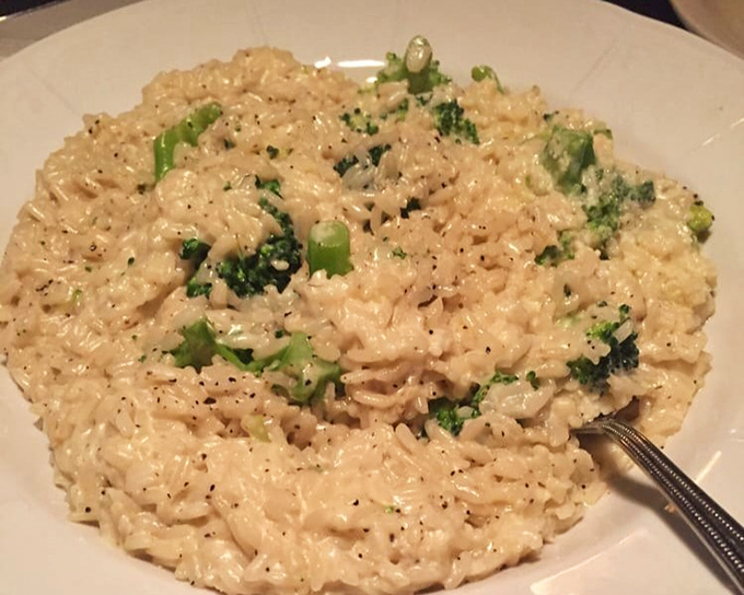 Creamy risotto studded with vibrant broccoli &ndash; proof that patience isn't just a virtue, it's the secret ingredient in this velvety masterpiece.