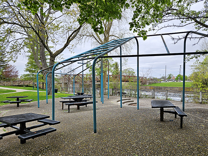 Picnic paradise! Riverside Park's sheltered tables invite lazy afternoon lunches where conversation flows as freely as the nearby water.