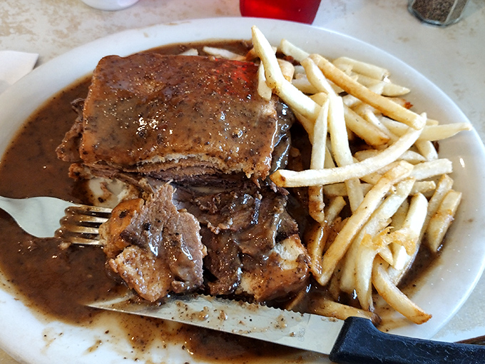 The hot roast beef sandwich isn't just a meal, it's an edible hug&mdash;tender meat surrendering to rich gravy, with crispy fries standing by for the inevitable dip.