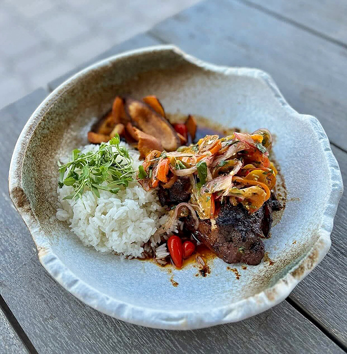 Tender pork shoulder so perfectly roasted, it practically falls apart at the mere suggestion of a fork.