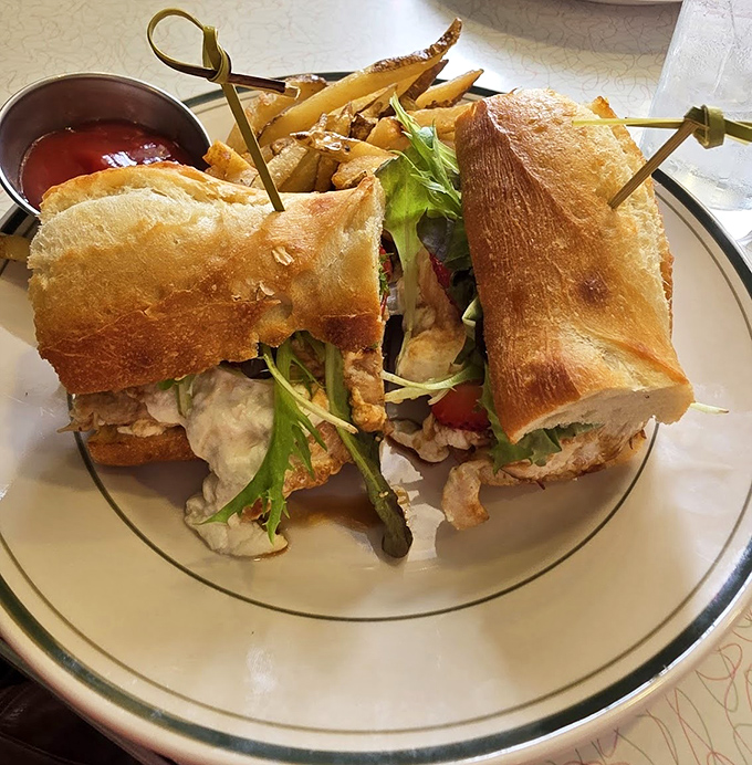 This isn't just a sandwich; it's architecture with bread as the foundation and fresh ingredients as the masterpiece.