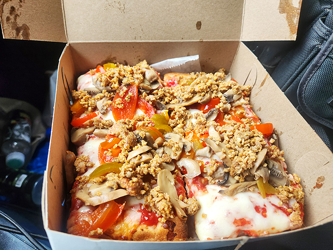 This isn't just sausage pizza &ndash; it's a meaty masterpiece where sweet peppers and mushrooms join forces with crumbled sausage in perfect harmony.