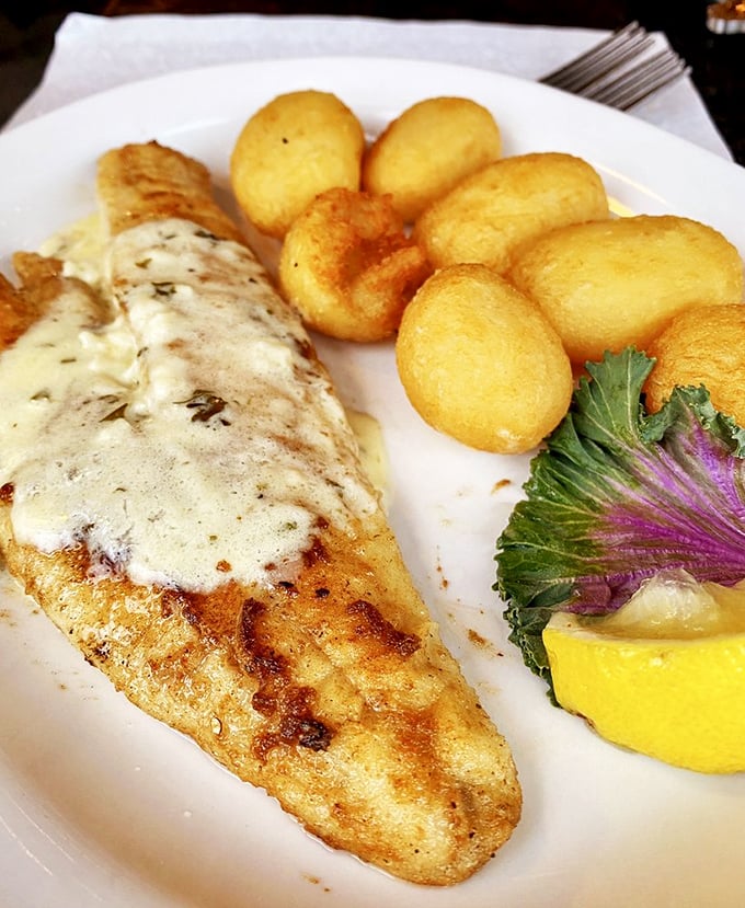 Behold the star of the show: saut&eacute;ed walleye with golden potato puffs. That fish has a tan better than anything I achieved all summer.