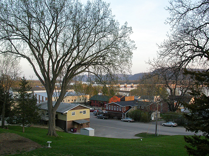 Twilight transforms Trempealeau into a Norman Rockwell painting come to life. The golden hour here feels like stepping into a simpler, more beautiful time.