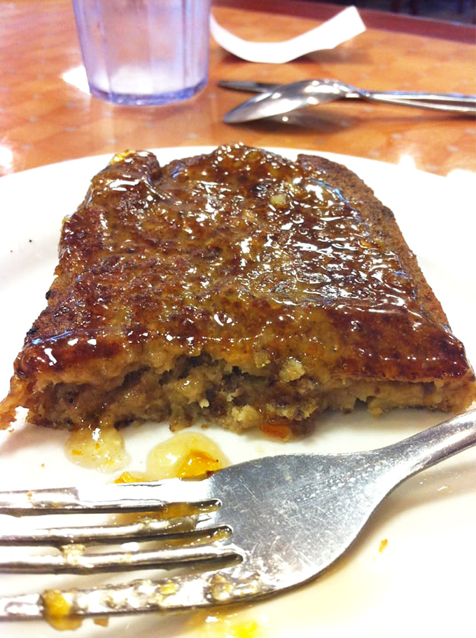 Behold the holy grail of Pennsylvania Dutch cuisine—scrapple fried to golden perfection with that crispy exterior giving way to savory goodness inside.