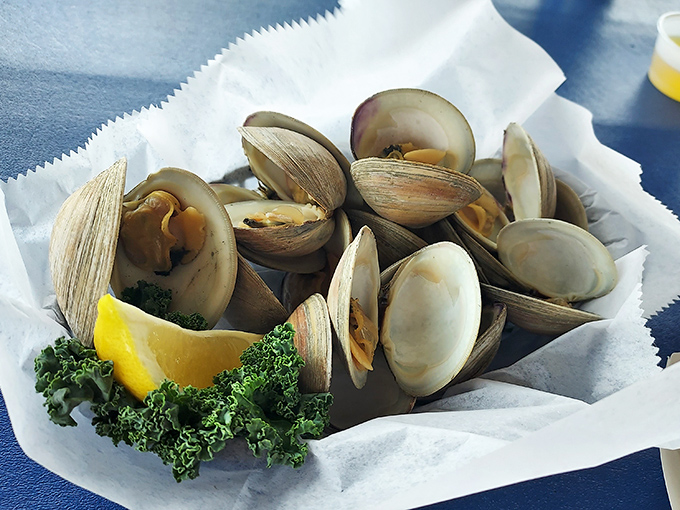 These steamers aren't just shellfish; they're time machines to childhood summers at the shore, complete with that essential lemon wedge.