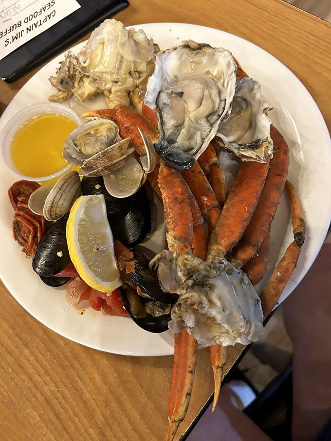 Ocean's bounty on a single plate. Those crab legs and oysters aren't just seafood&mdash;they're edible evidence that mountains and oceans can coexist deliciously.