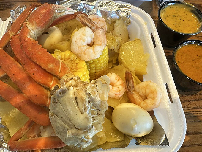 This seafood boil isn't just a meal&mdash;it's an event. Crab legs stretching toward freedom, plump shrimp, and corn soaking up all that seasoned goodness.