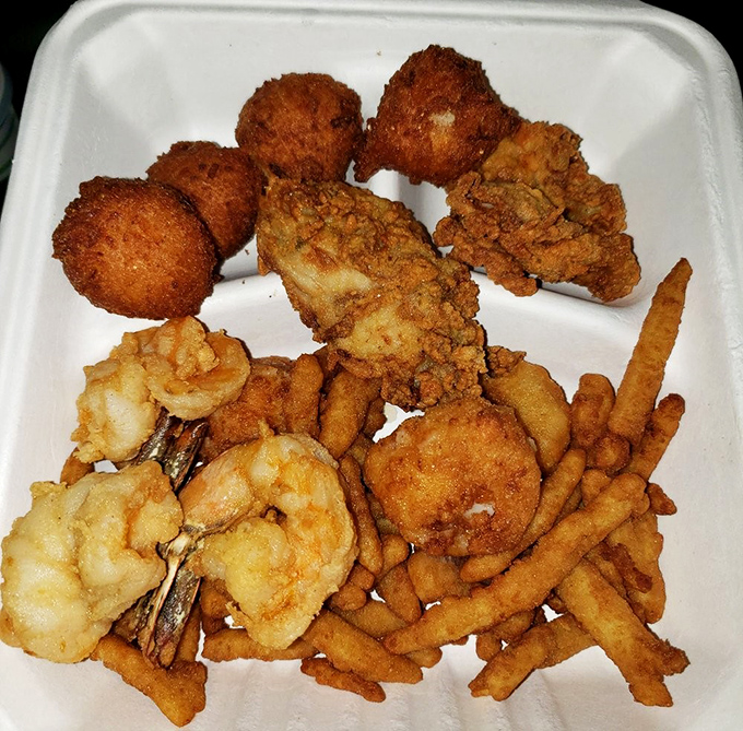 Golden-fried perfection that makes you want to high-five the chef. This seafood sampler is what happens when the ocean meets a fryer in culinary matrimony.