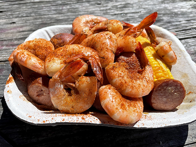 Low Country boil done right &ndash; plump shrimp, smoky sausage, and sweet corn dusted with spices that whisper, "Slow down and savor me."