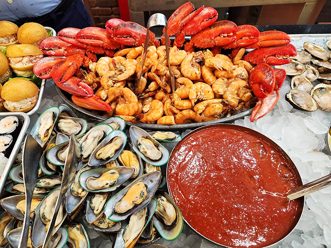 A seafood lover's fantasy come to life — a bountiful seafood buffet featuring lobster, mussels, and shrimp, all arranged like a maritime masterpiece that would make Neptune himself jealous.