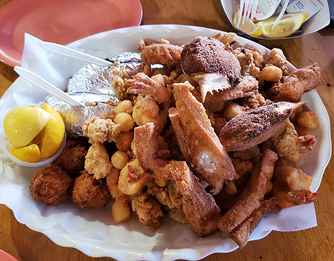 Behold the mountain of fried magnificence! This seafood platter doesn't just feed you&mdash;it tells stories of the Atlantic in crispy, golden chapters.
