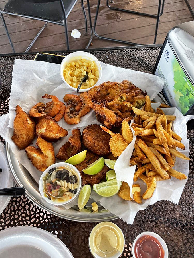 This isn't just a seafood platter; it's a Florida autobiography told through golden-fried treasures, fresh lime, and zero pretension.