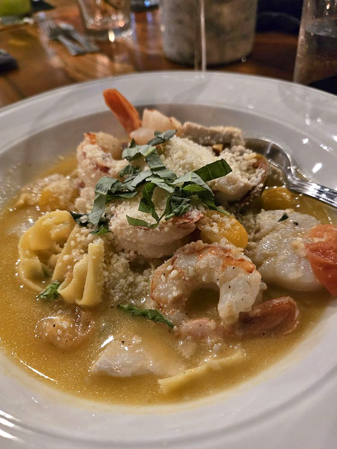 This seafood scampi isn't just dinner&mdash;it's a warm embrace from the Gulf itself, with each shrimp whispering tales of tidal pools.