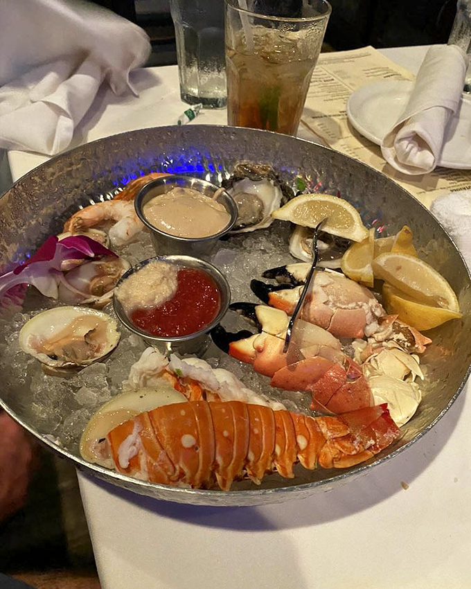 Seafood royalty on ice! This platter showcases Florida's finest treasures with lobster tail, stone crab claws, and oysters &ndash; Neptune's jewelry box opened for your pleasure.